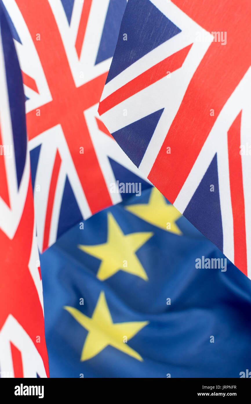 Cluster of mini Union Jack flags. Metaphor British patriotism, being ...