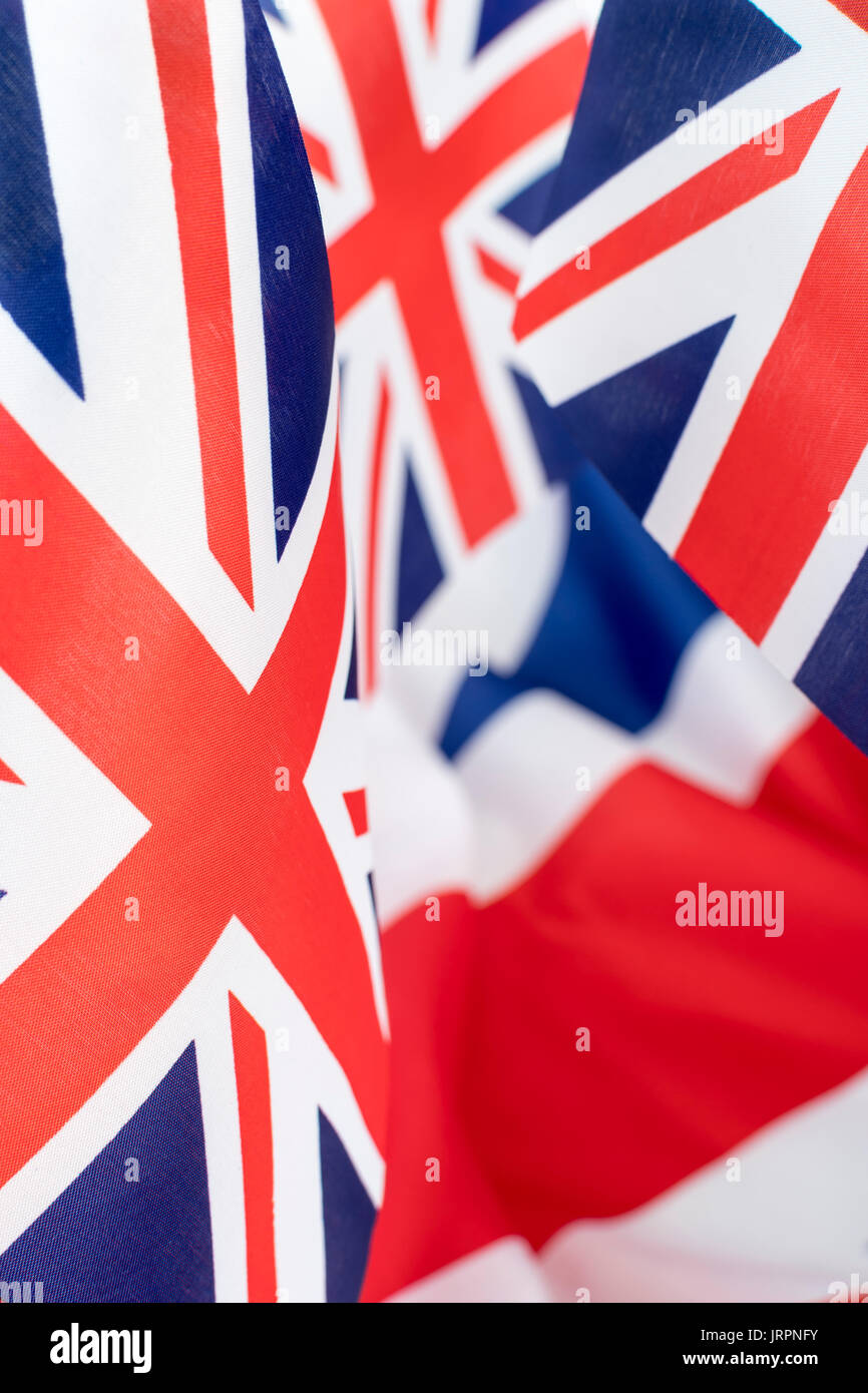 Clustered mini Union Jack flags. British patriots, being patriotic ...