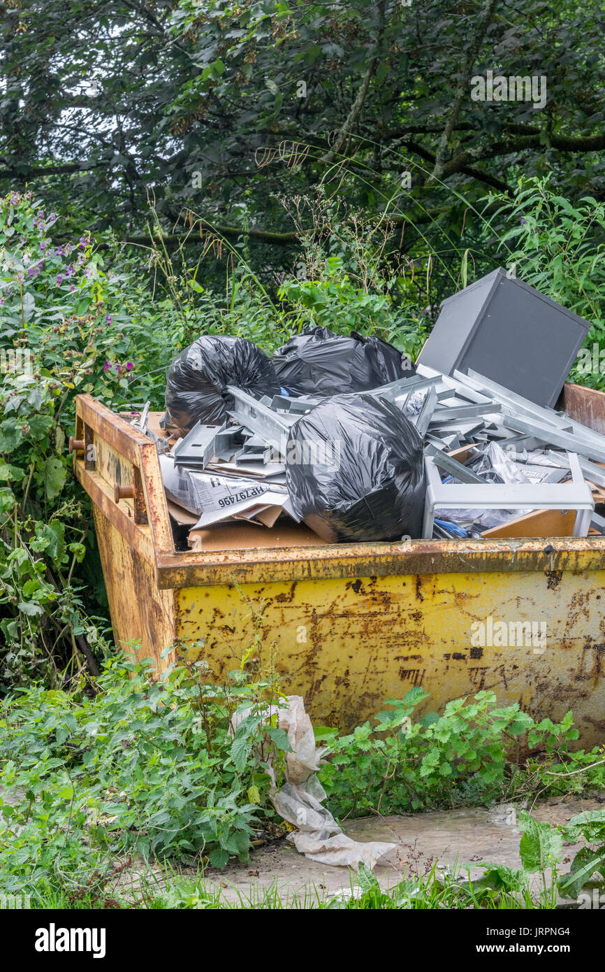 Builder's skip filled with industrial rubbish / waste. War on plastic ...