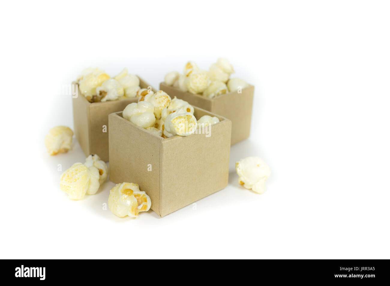 Sweet caramel popcorn isolated on white background Stock Photo - Alamy