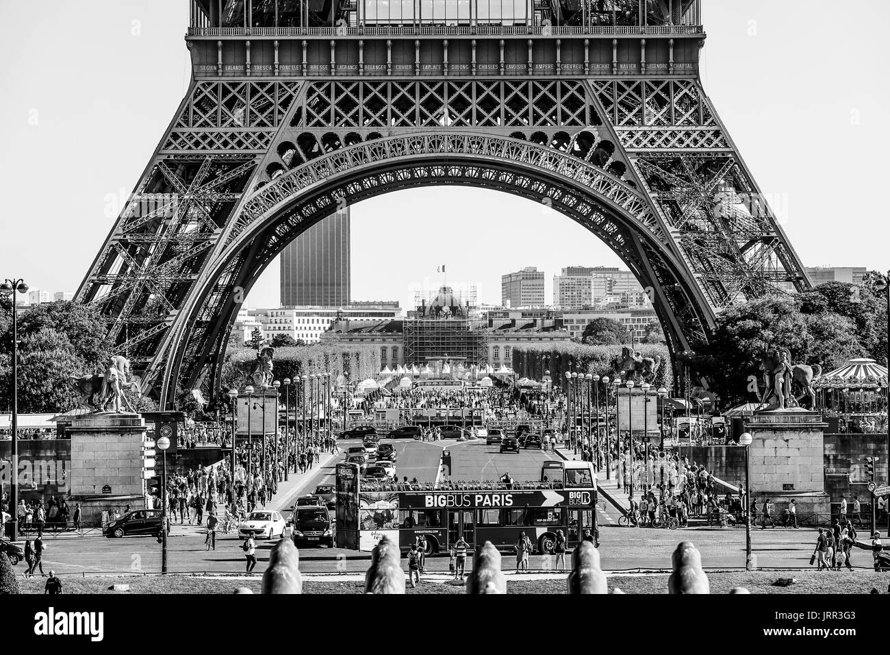 The streets under Eiffel Tower - a busy place - PARIS / FRANCE ...