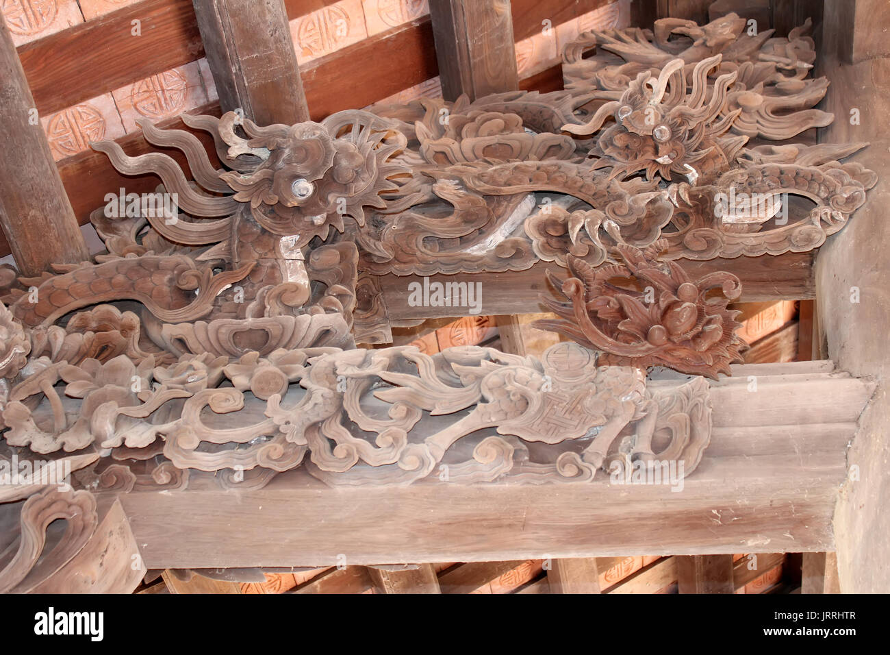 Ancient pattern on wood in vietnam temple Stock Photo - Alamy