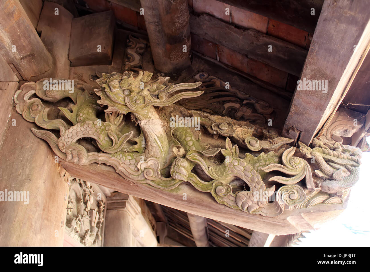 Ancient pattern on wood in vietnam temple Stock Photo - Alamy