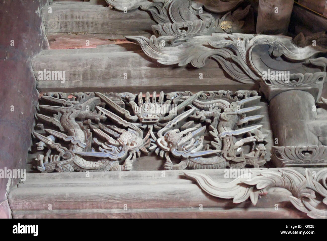 Ancient pattern on wood in vietnam temple Stock Photo - Alamy