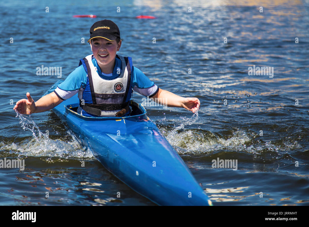 A boy in a row club in Poland. Hard work on a sport form in rowing and ...