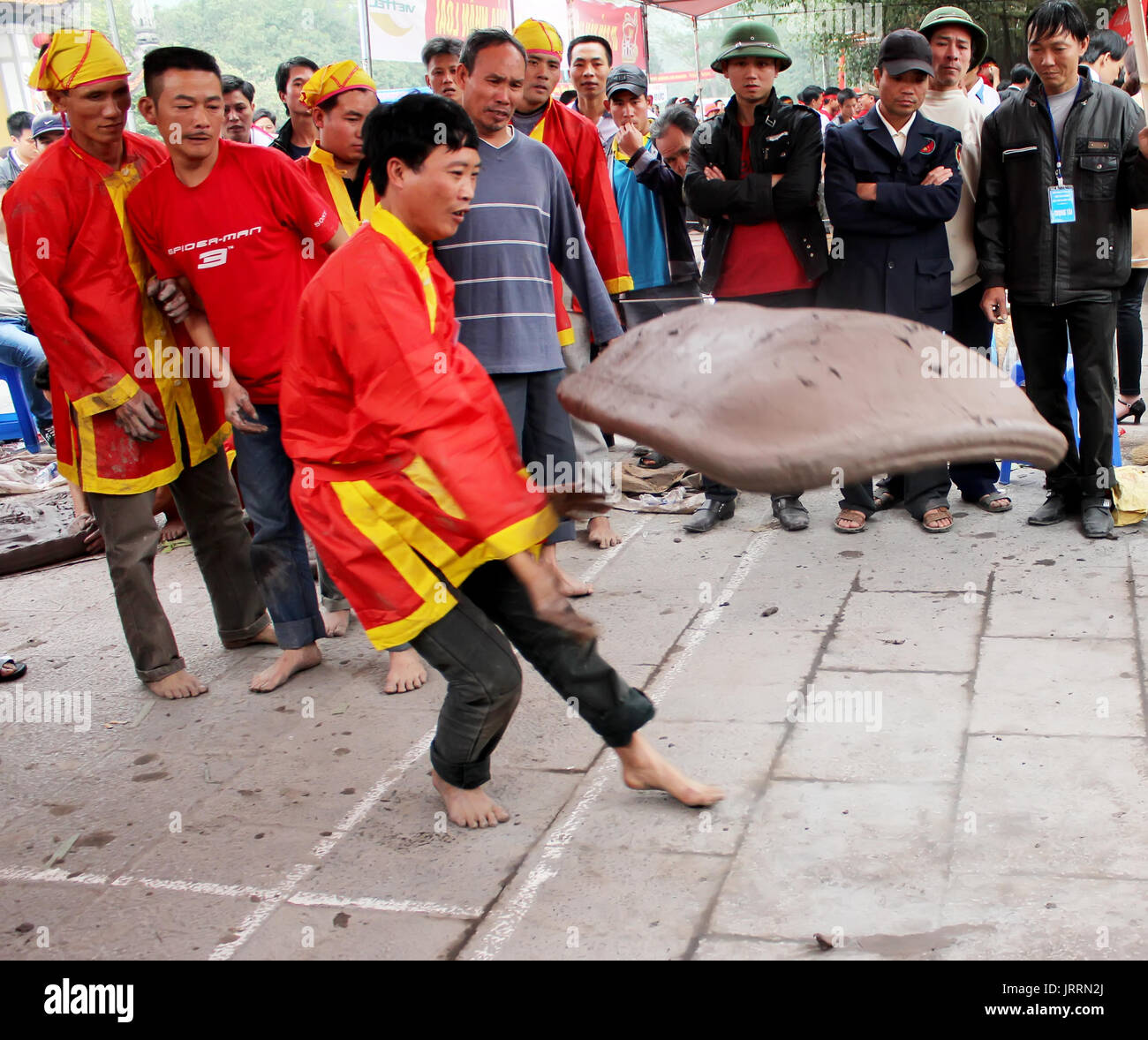 HAI DUONG, VIETNAM, February, 25: Vietnamese farmers play firecracker ...