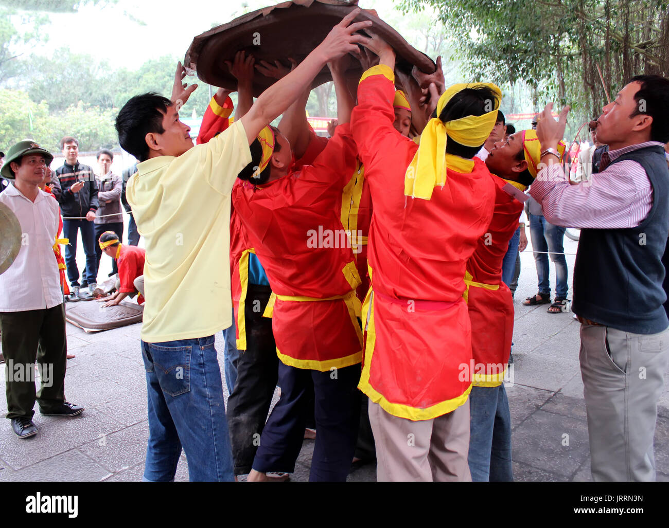 HAI DUONG, VIETNAM, February, 25: Vietnamese farmers play firecracker ...