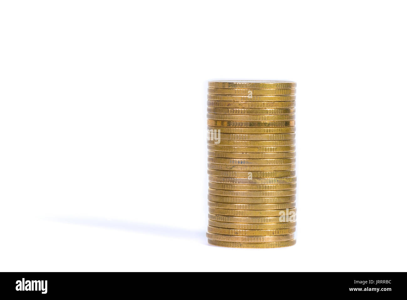 Columns of gold coins, piles of coins arranged on white background ...