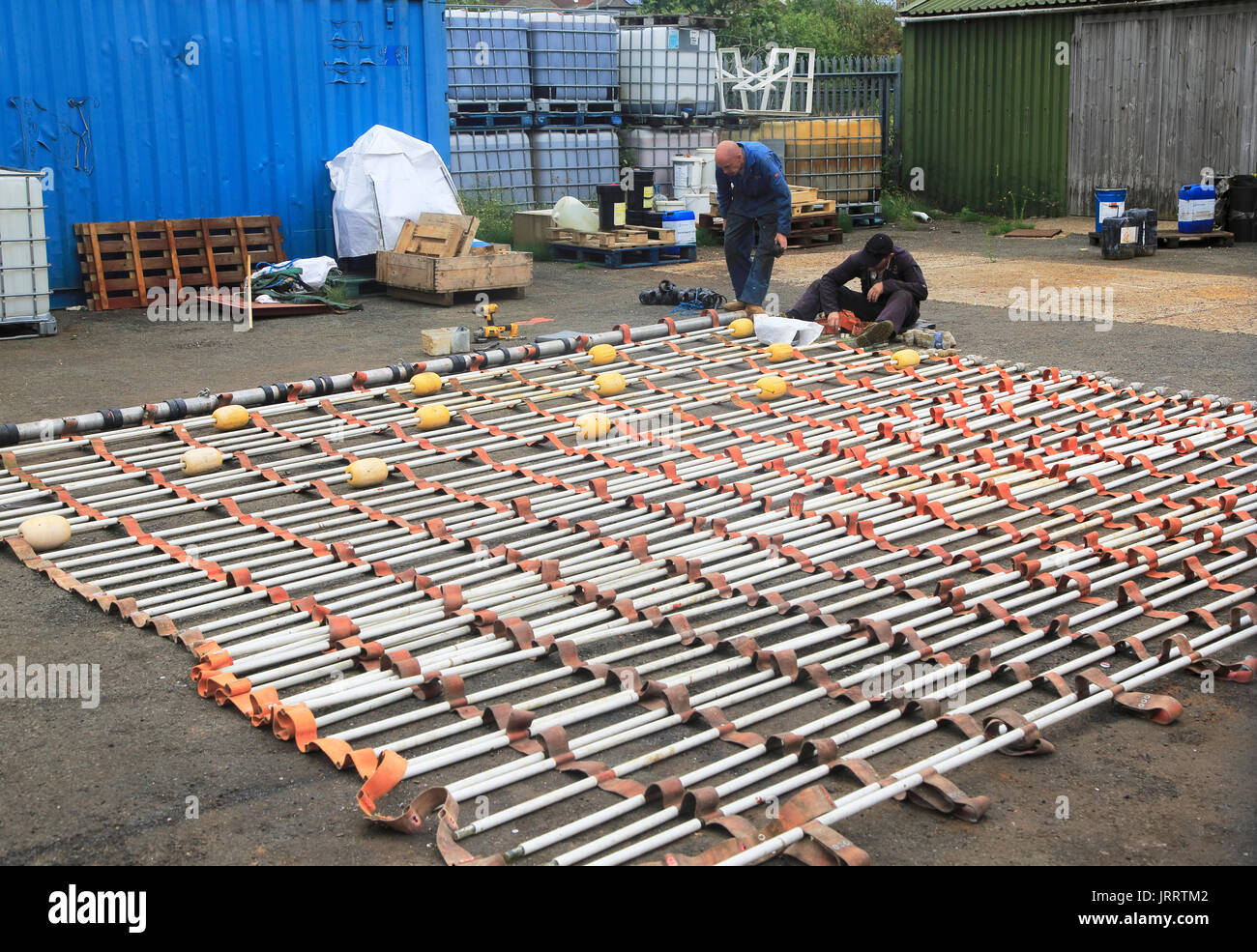Men working on Dacon Rescue Scoop, Boston Putford Offshore Safety ...