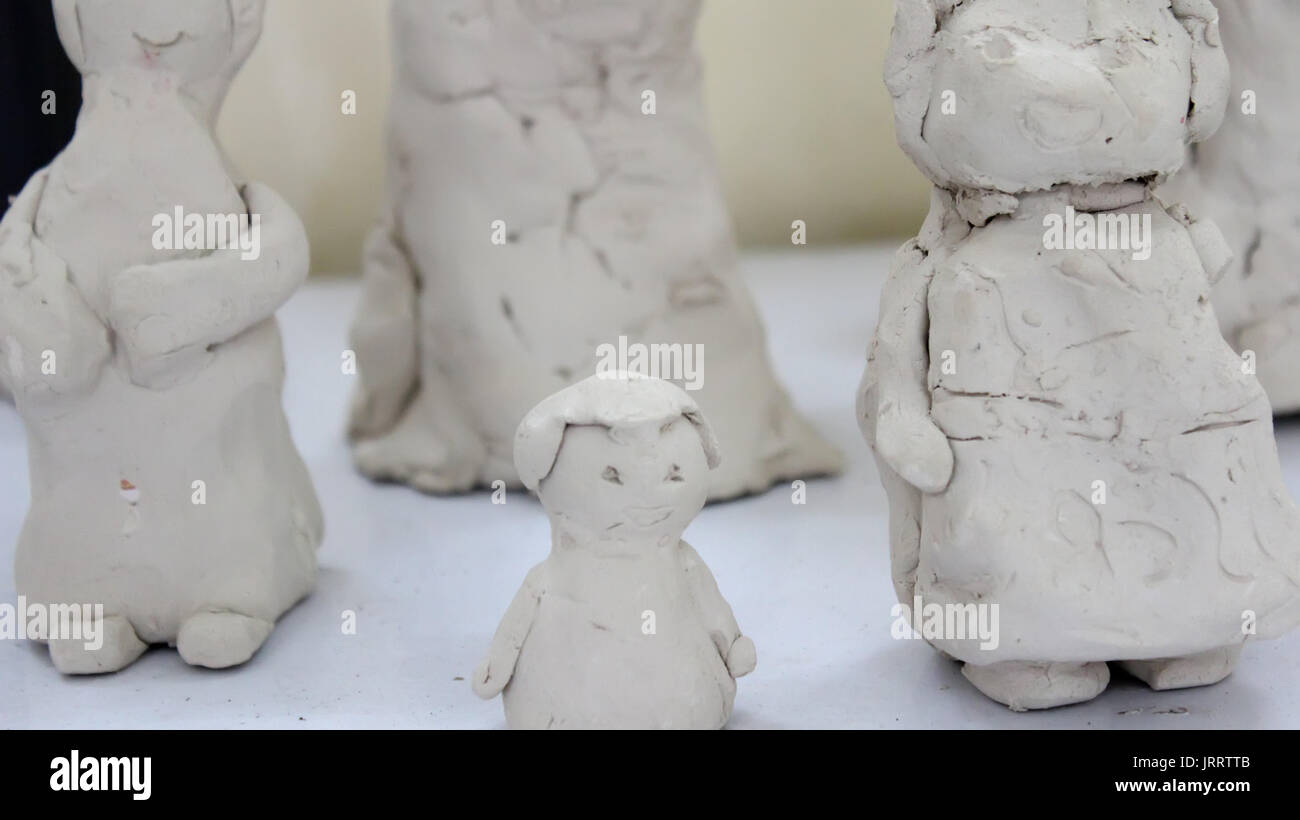 the white clay statue fun Stock Photo - Alamy