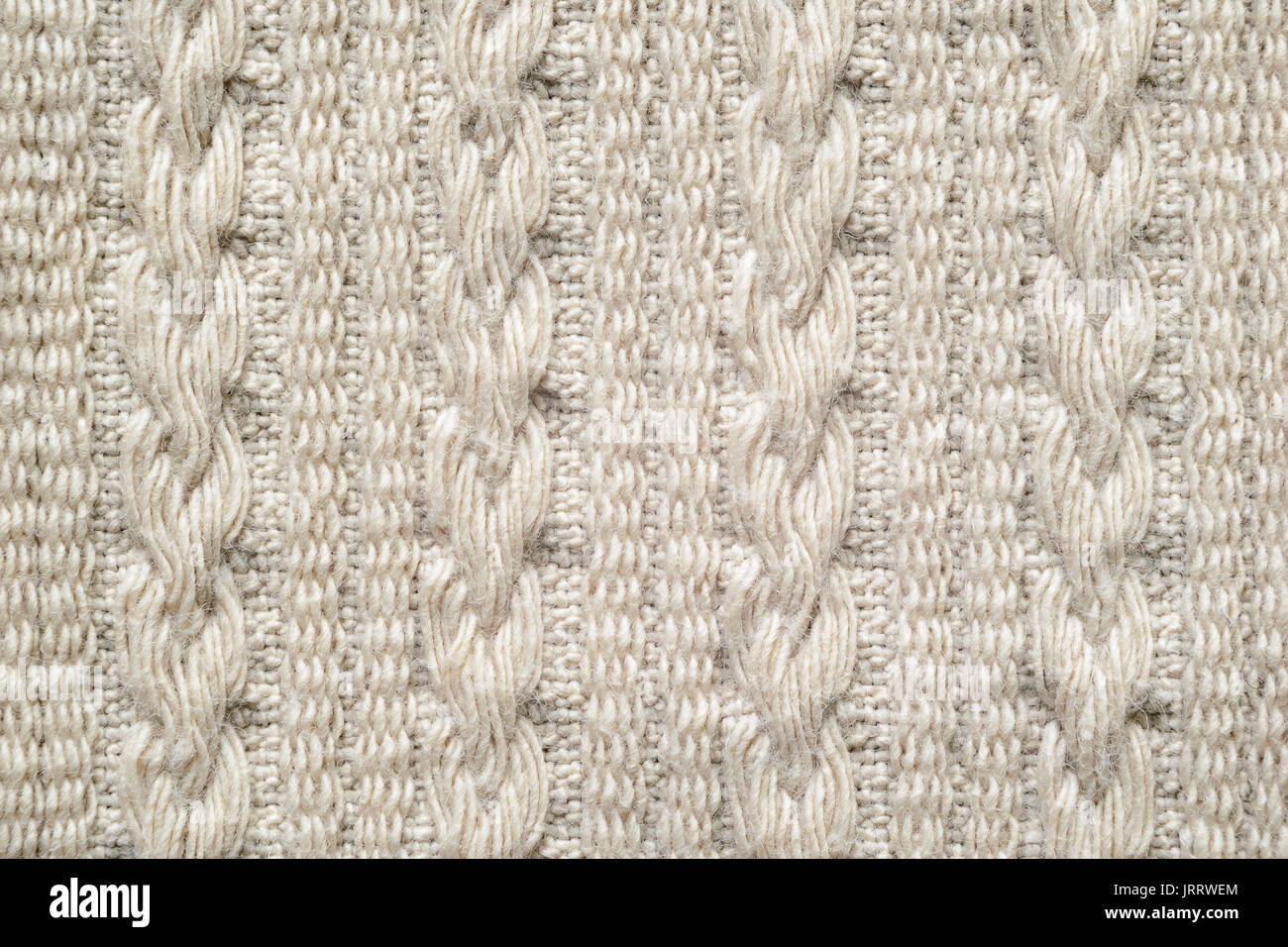 Pigtails on Beige Knitwear Fabric Texture. Machine Knitting Texture ...