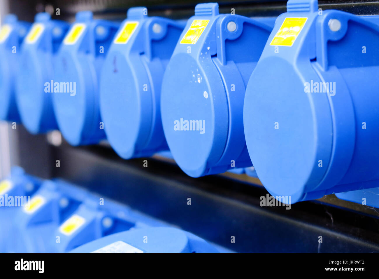 image of power plugs connected background Stock Photo - Alamy