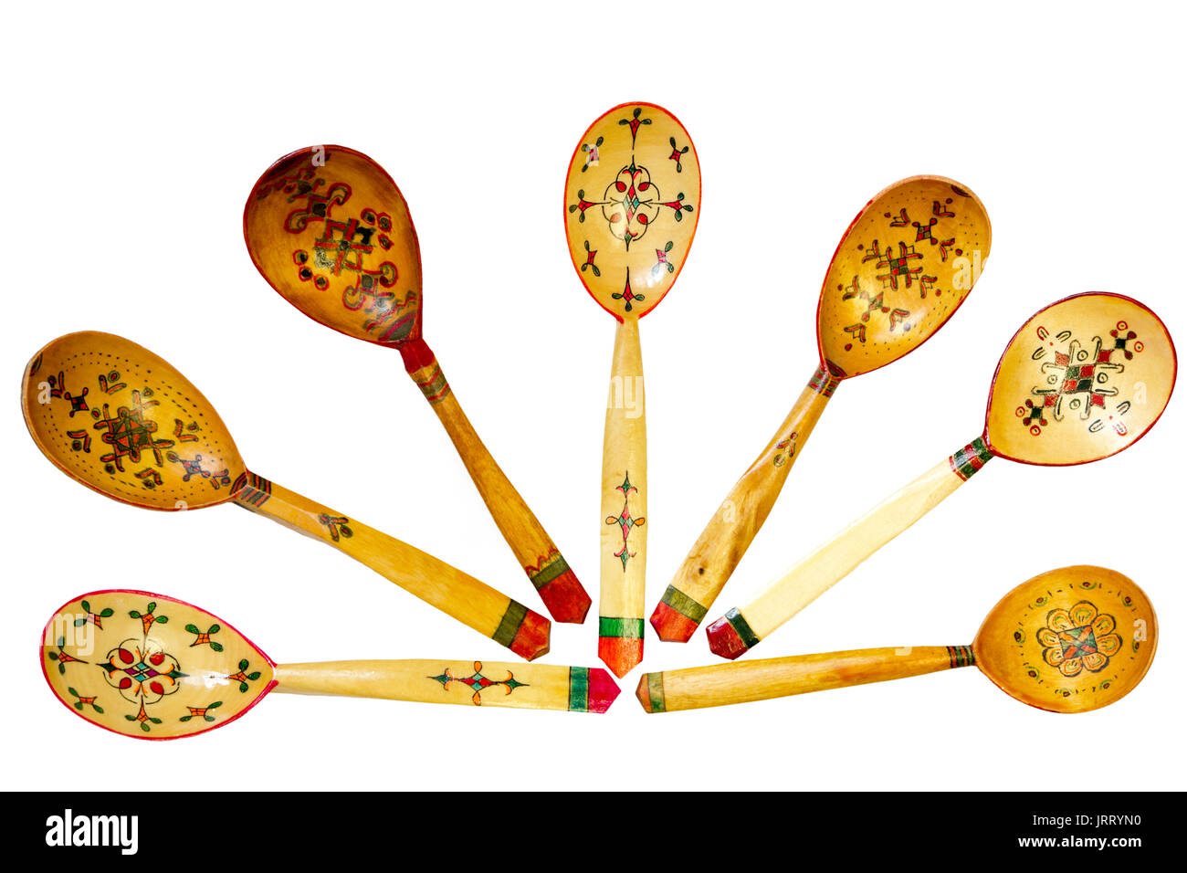 Some painted spoons isolated on white background Stock Photo - Alamy