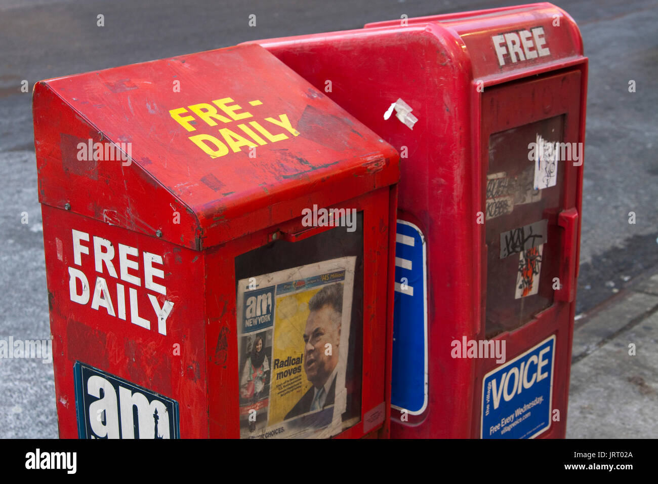 Free newspaper vending machines on street in Manhattan, NY Stock Photo ...