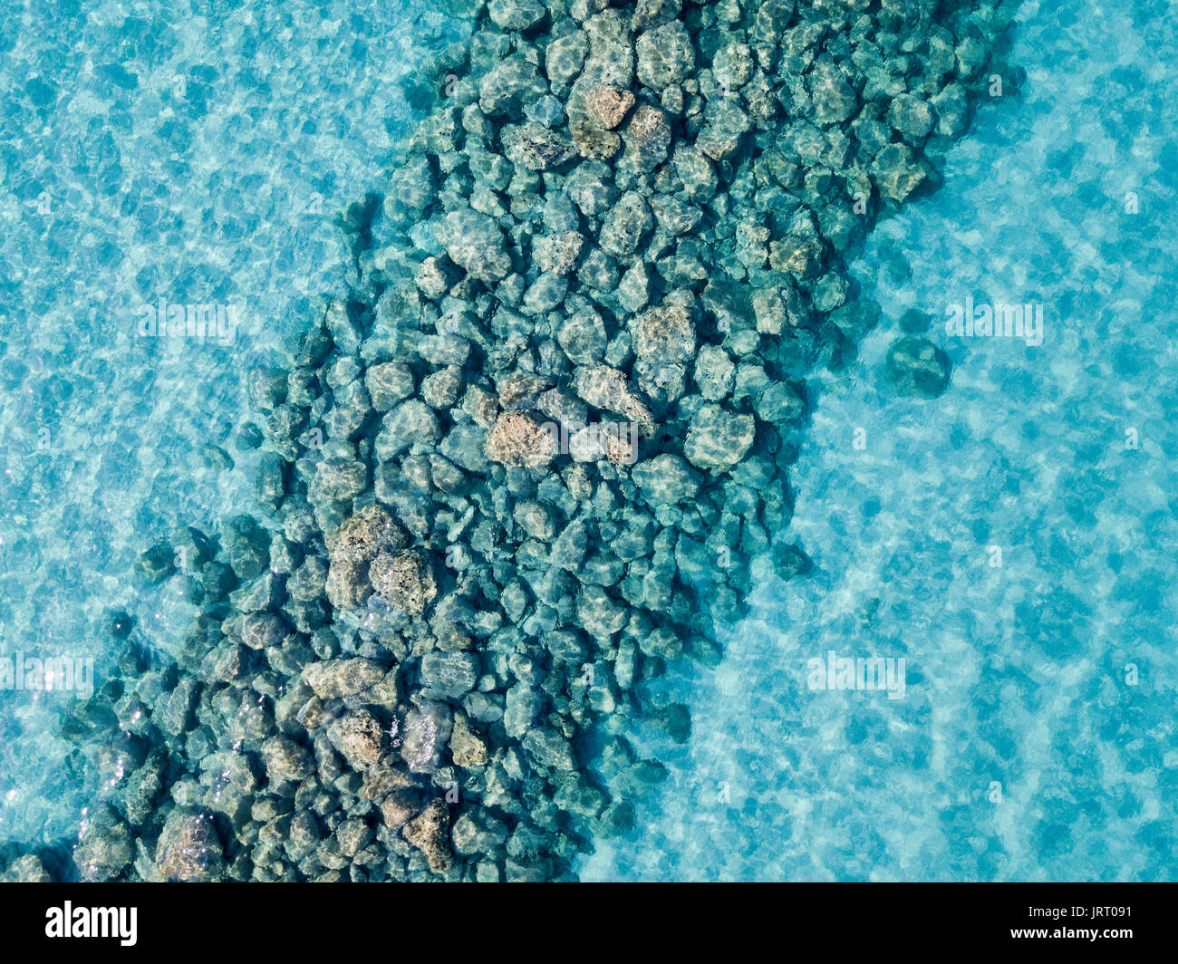 Aerial view of rocks on the sea. Overview of the seabed seen from above ...