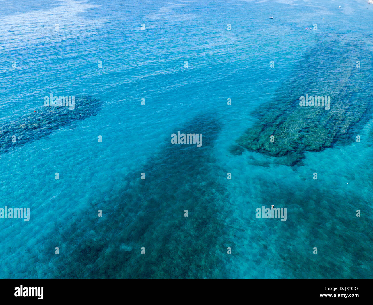 Aerial view of rocks on the sea. Overview of the seabed seen from above ...