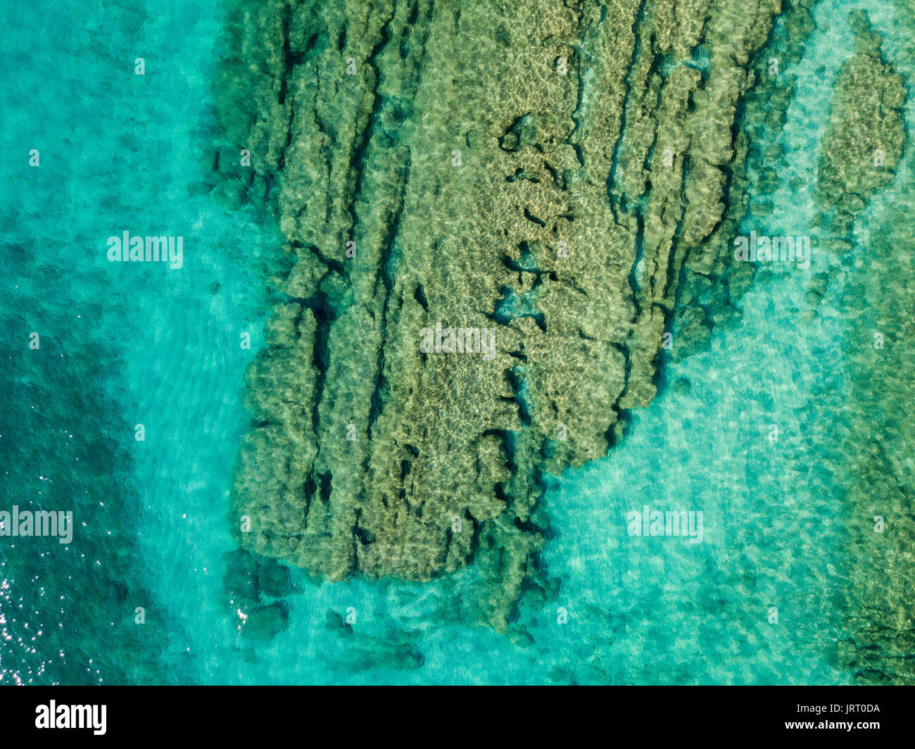 Aerial view of rocks on the sea. Overview of the seabed seen from above ...