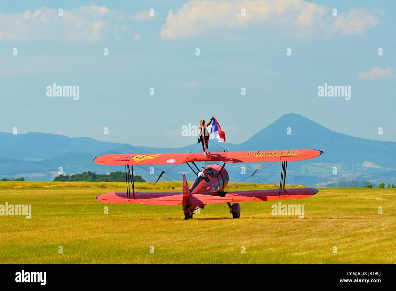 Red bi wing plane flying hi-res stock photography and images - Alamy