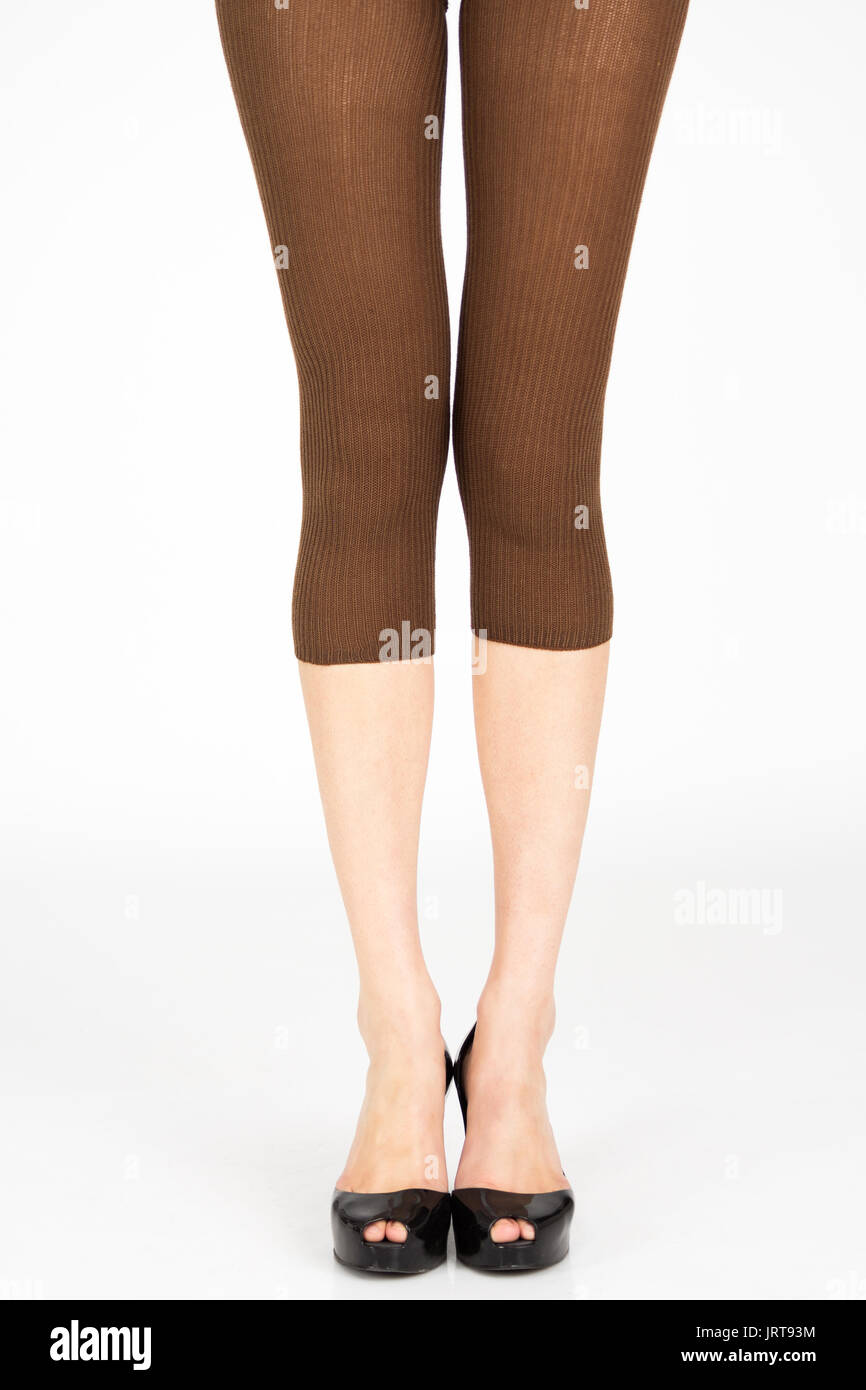 Long slim female legs Stock Photo - Alamy