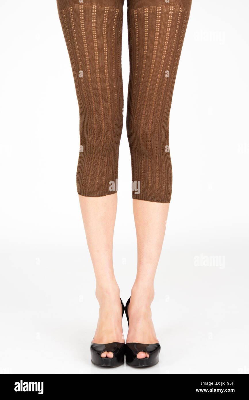 Long slim female legs Stock Photo - Alamy