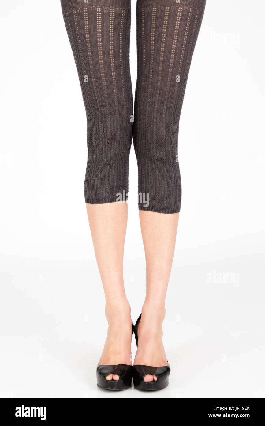 Long slim female legs Stock Photo - Alamy