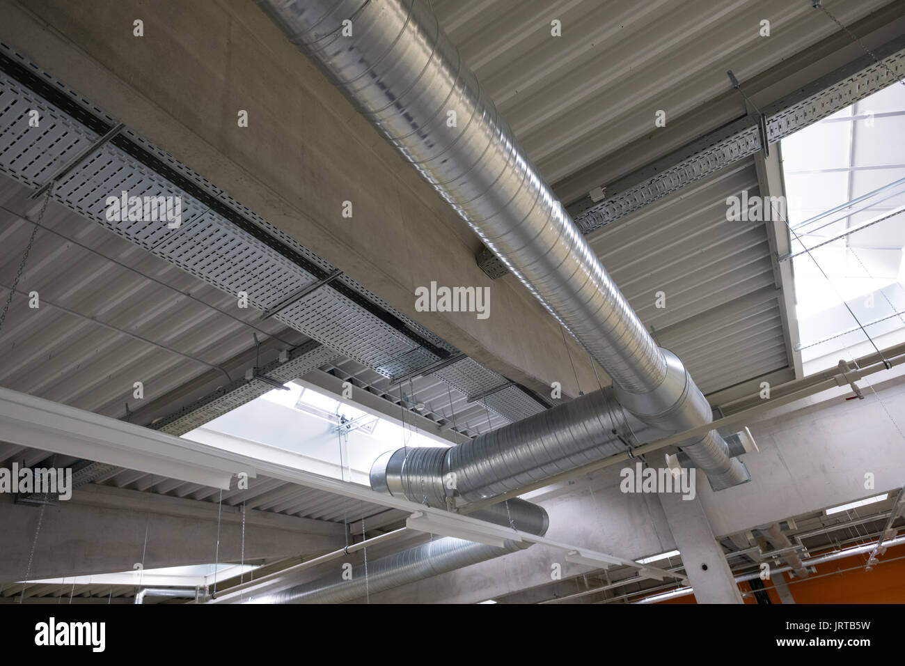 Industry tubes of a air condition in a building at the ceiling Stock ...