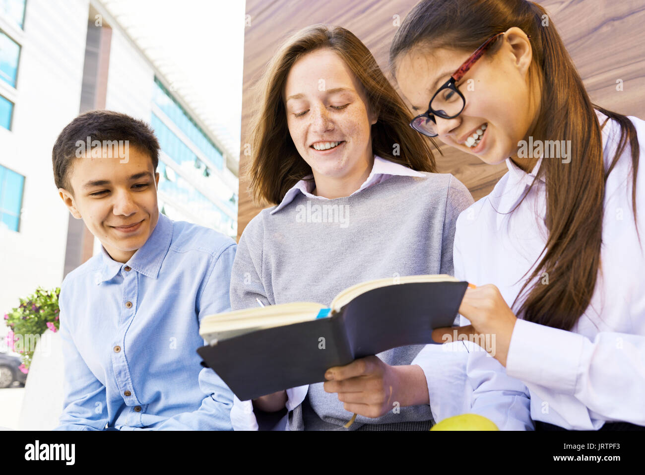 Children Copying Homework by School Building Stock Photo - Alamy Children Copying Homework by School Building Stock Photo - Alamy