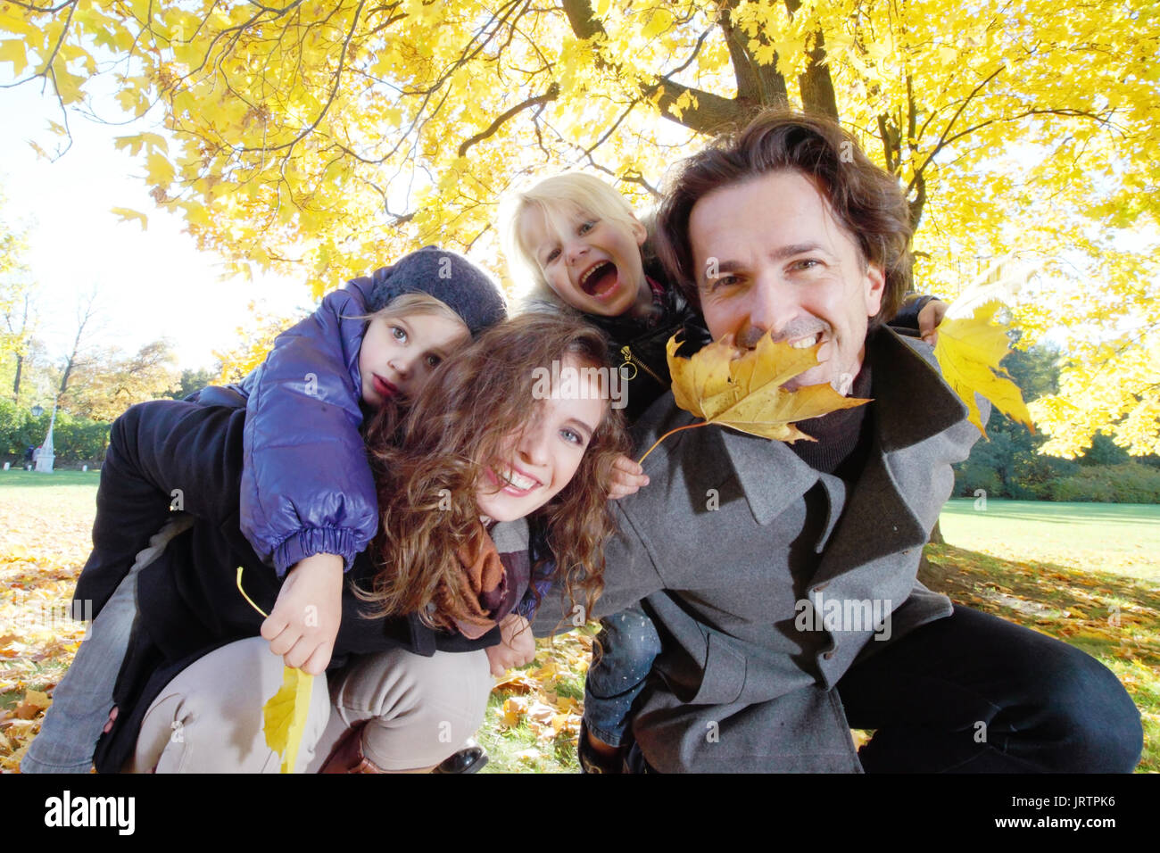 Boy giving piggyback ride girl hi-res stock photography and images - Alamy