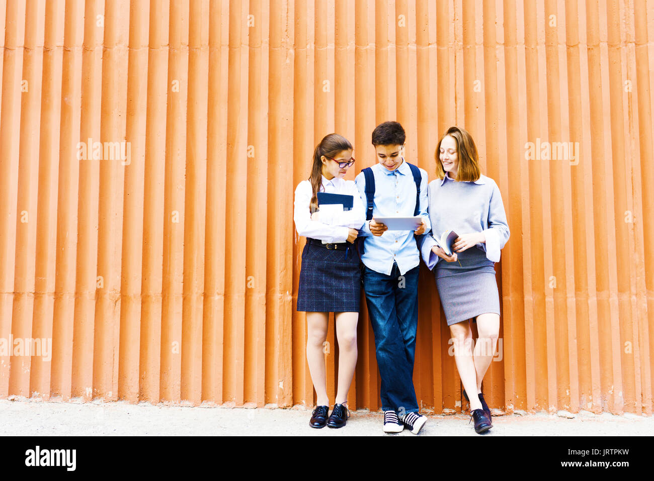 Modern Schoolchildren with digital Tablet Stock Photo - Alamy