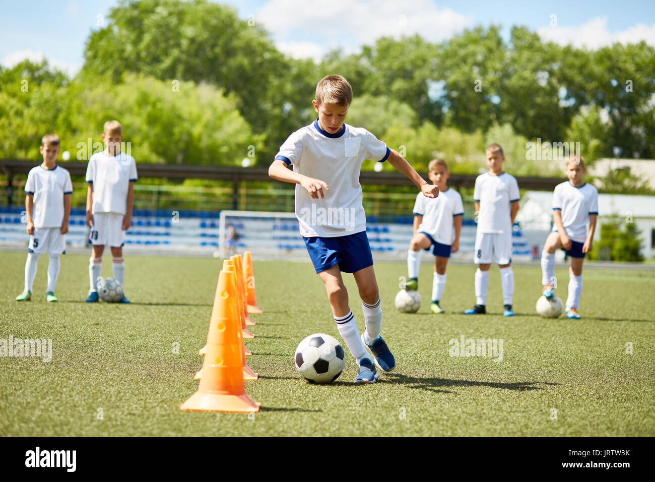 Junior Football Player at Practice Stock Photo - Alamy