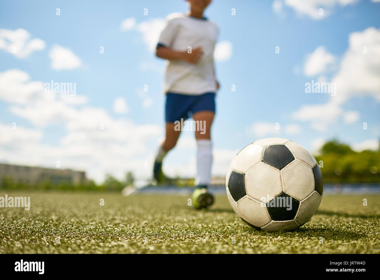 Young Boy Playing Sports Stock Photo - Alamy