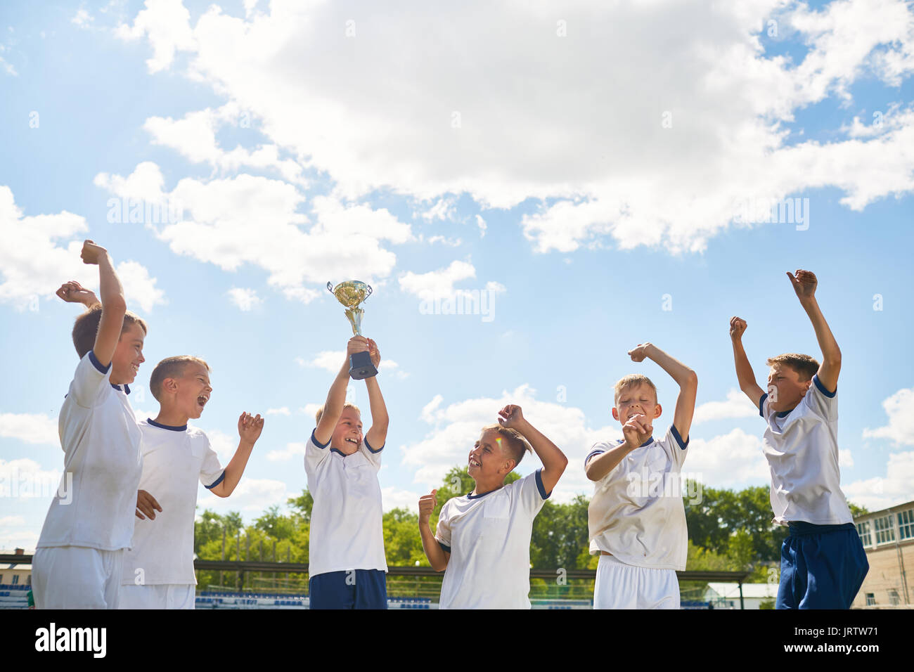 Junior Football Team Celebrating Winning Stock Photo - Alamy