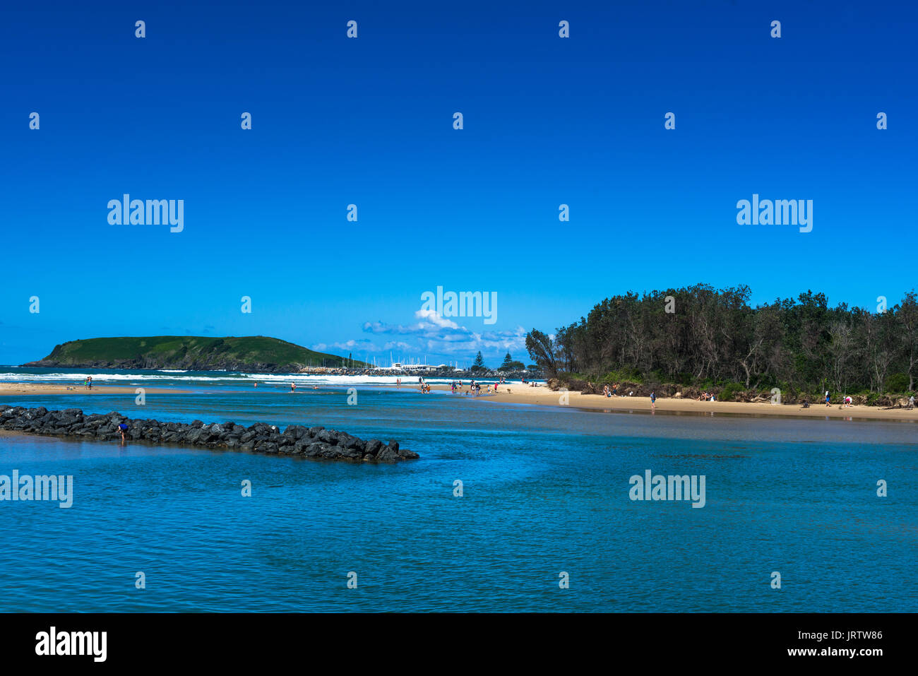 Coffs creek reaches the sea at Park beach with Mutton Bird Island to ...
