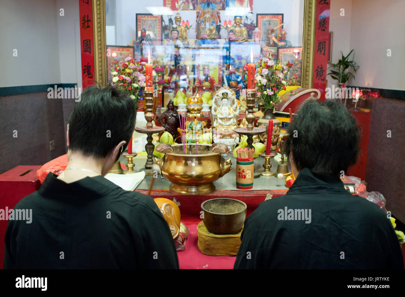 Praying in Buddhist Temple in New York's Chinatown, Amitabha Buddhist ...