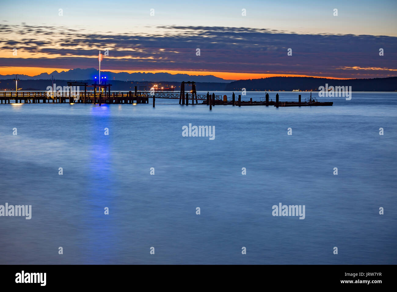 Tacoma docks at sunset with American flag. The bay in Tacoma Washington ...