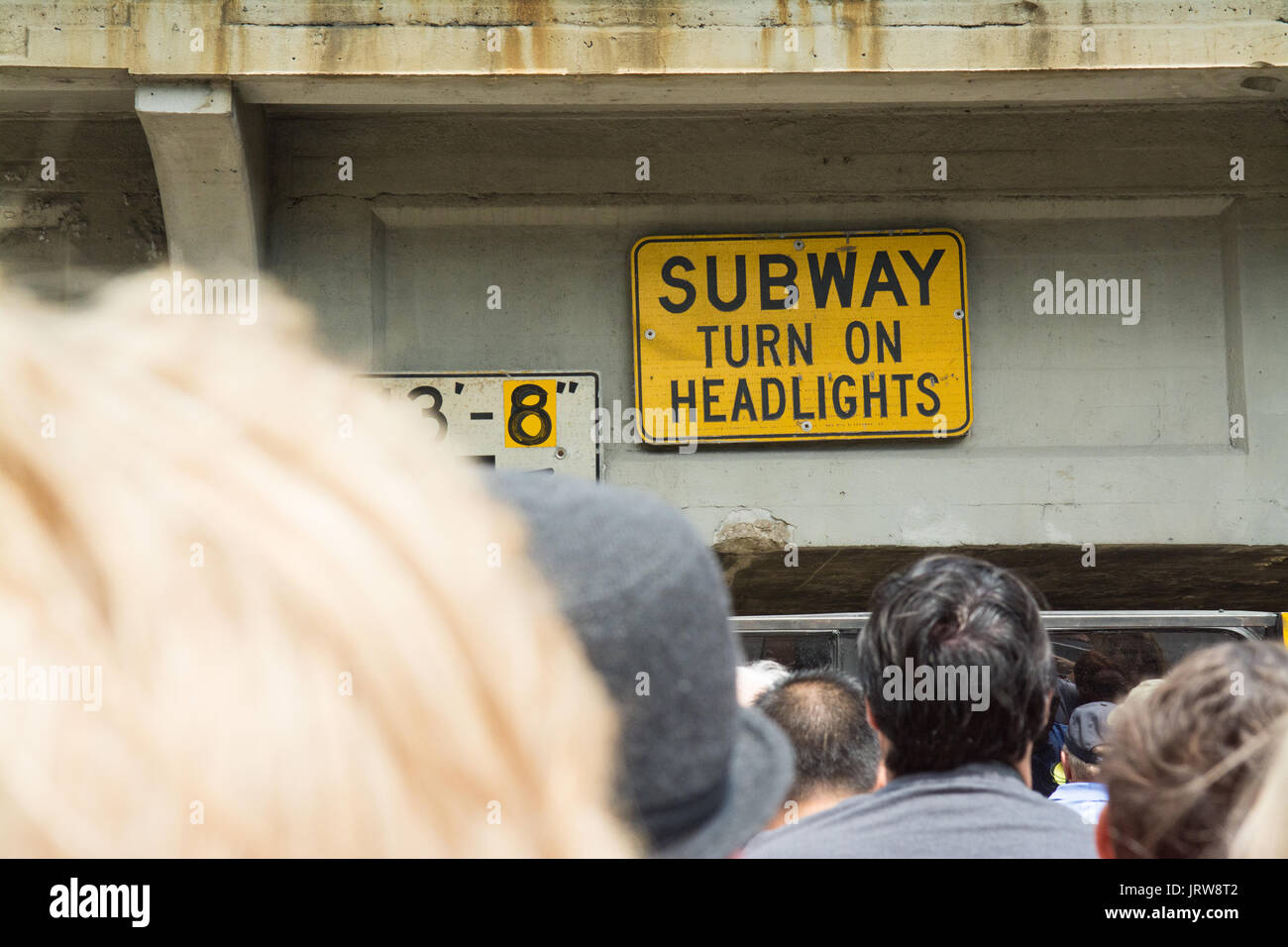 Toronto open top sightseeing bus passing under low bridge Stock Photo ...