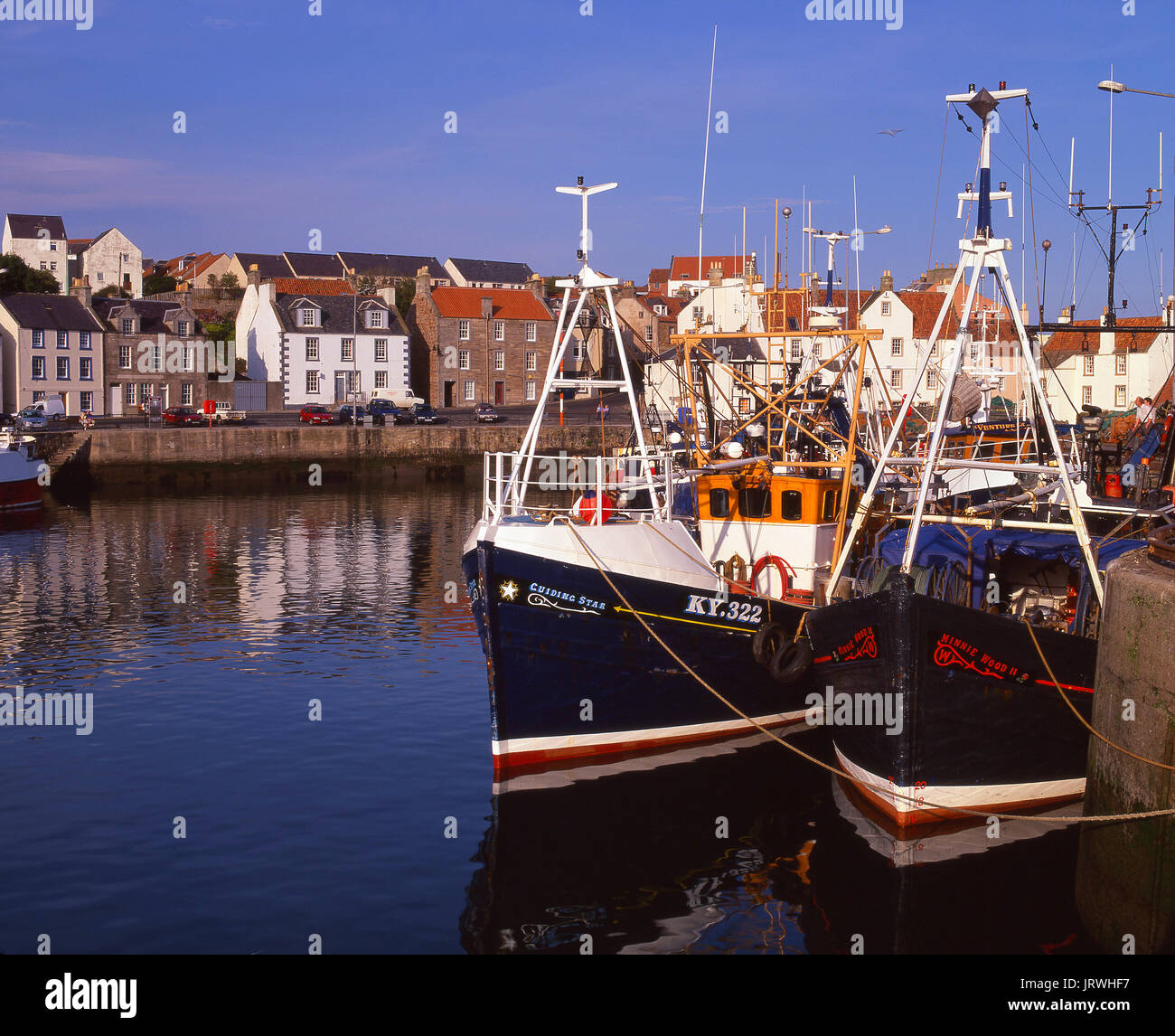 A colourful scene in the picturesque fishing hamlet of Pittenweem, East ...