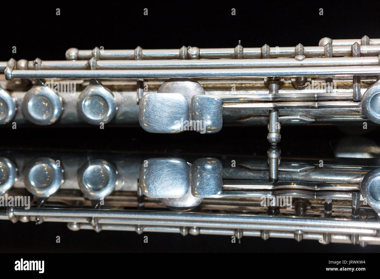 symphonic music concept - closeup on western concert flute lies on the ...