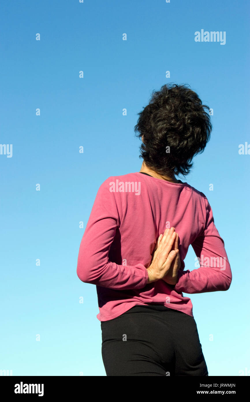 Yoga posture hands behind back hi-res stock photography and images - Alamy