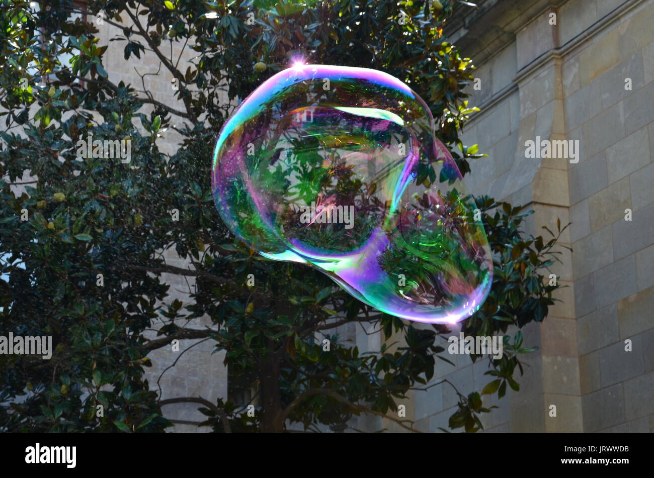 Blowing bursting bubbles hi-res stock photography and images - Alamy