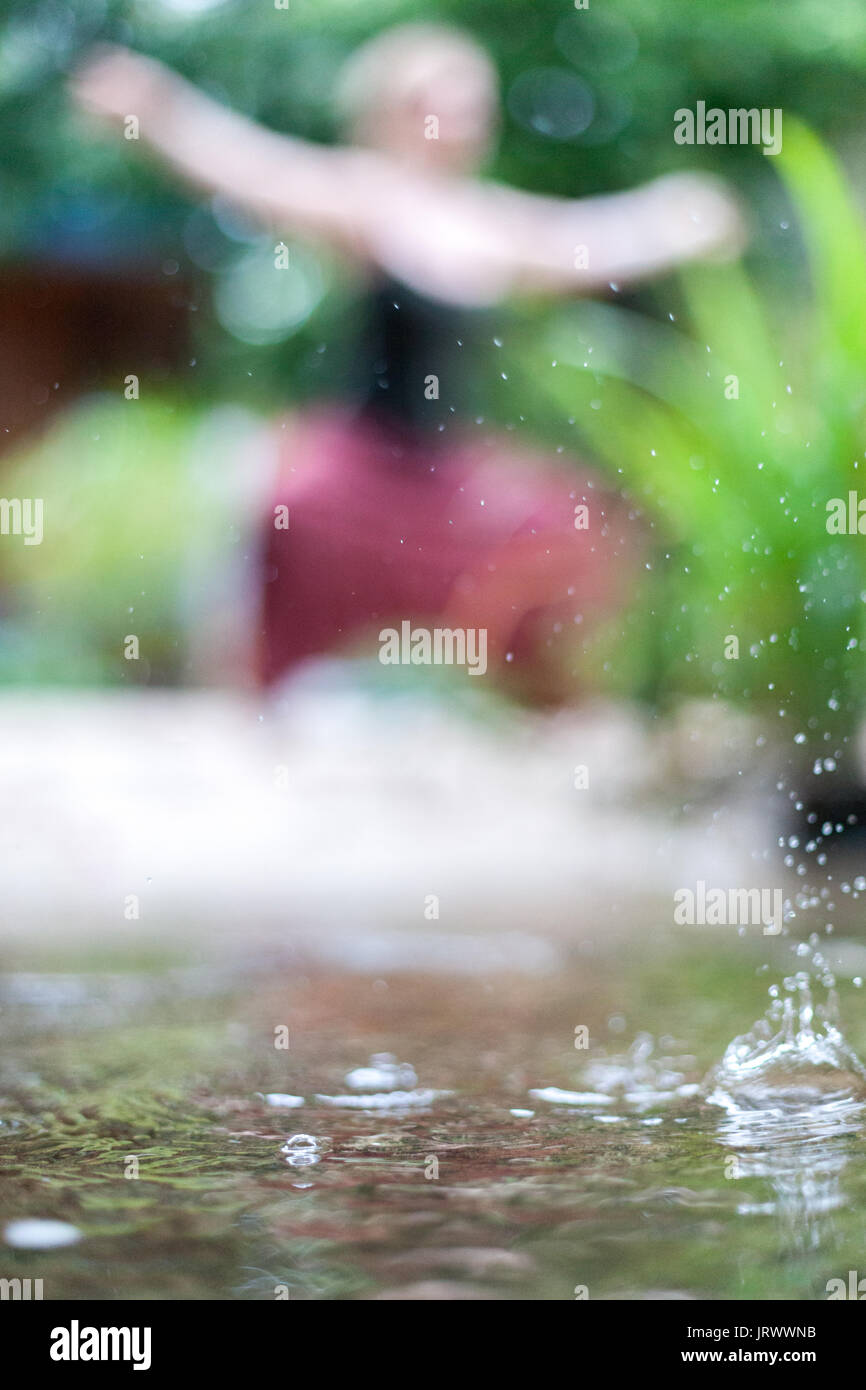 Connecting with mother nature by doing a yoga practice in the rain ...