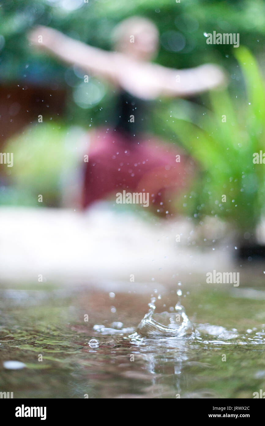 Connecting with mother nature by doing a yoga practice in the rain ...