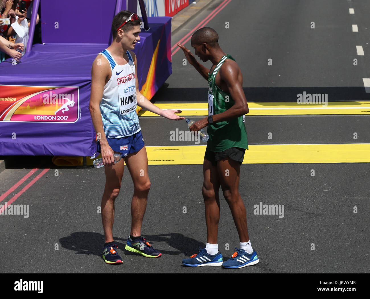 Great Britain's Callum Hawkins celebrates with bronze medallist ...