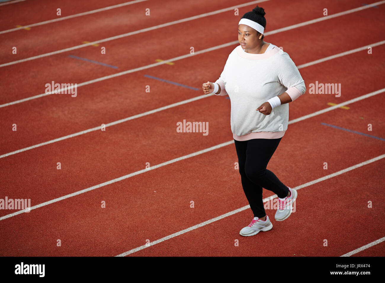 Fat woman running hi-res stock photography and images - Alamy
