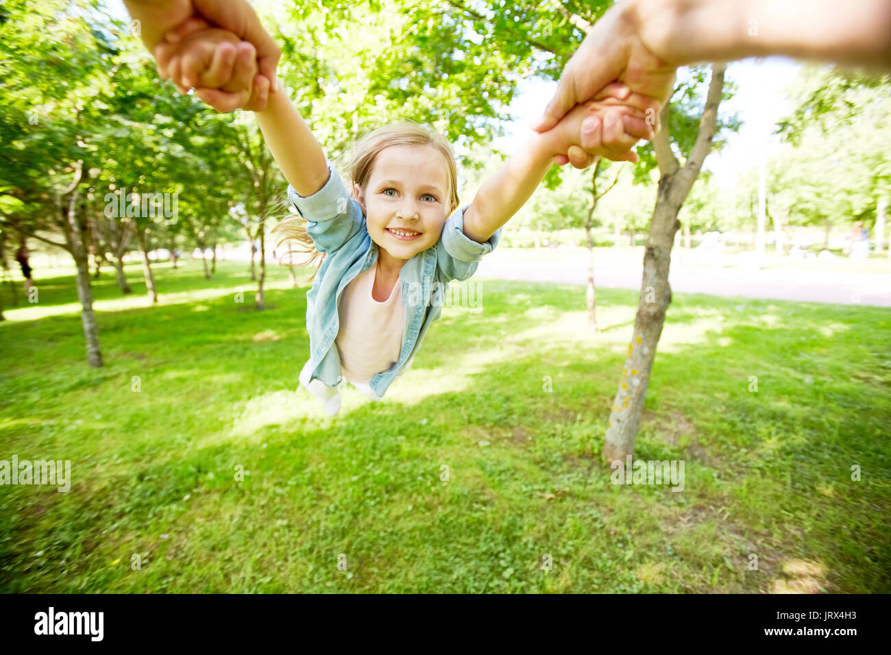Child whirling hi-res stock photography and images - Alamy