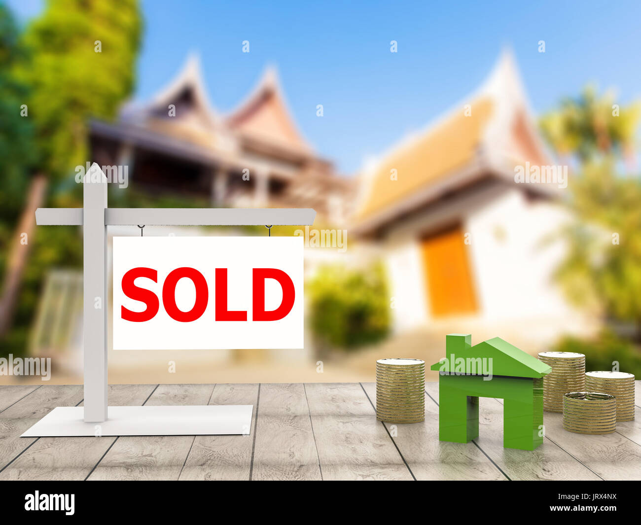 sold house sign with mock up house and gold coins Stock Photo - Alamy