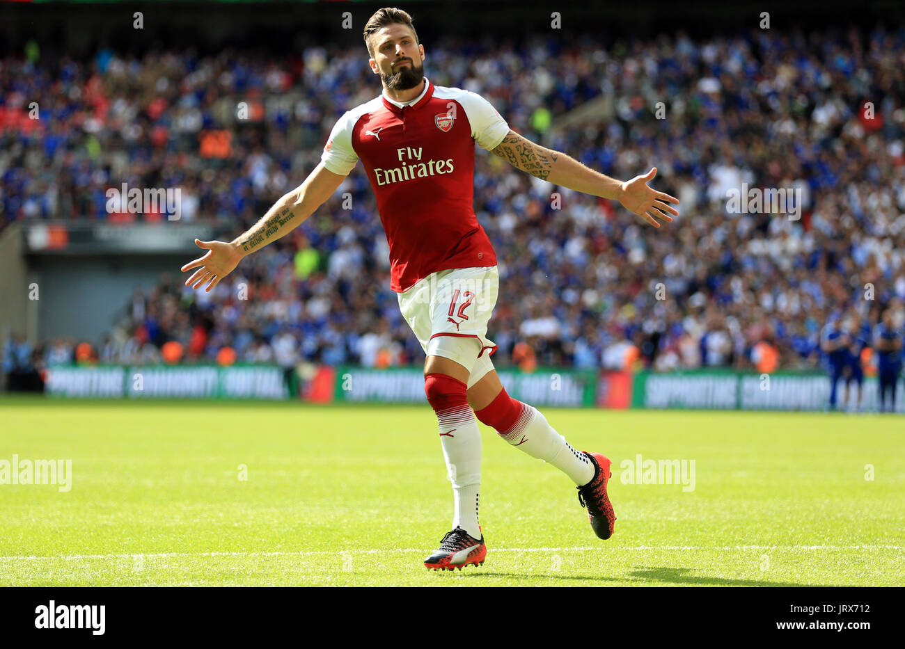 Arsenal's Olivier Giroud celebrates after scoring the winning penalty ...