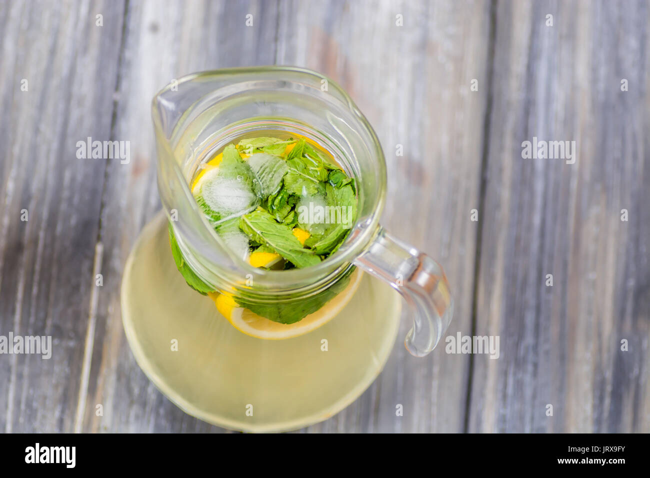 a cold refreshing drink on a wooden background Stock Photo - Alamy