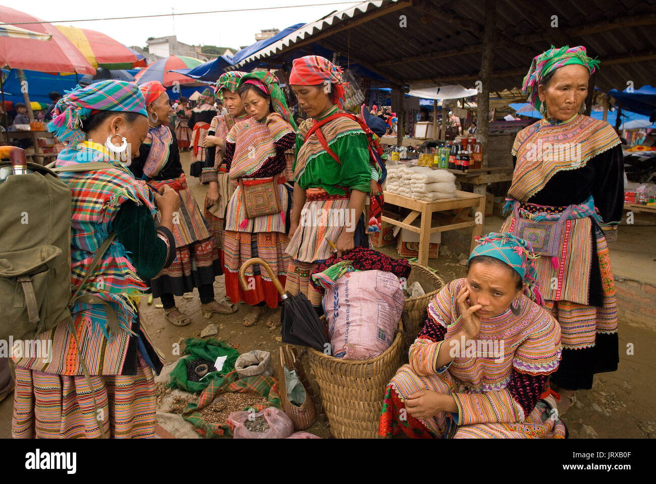 Bac Ha market. Flower Hmong people in traditional dress at weekly ...