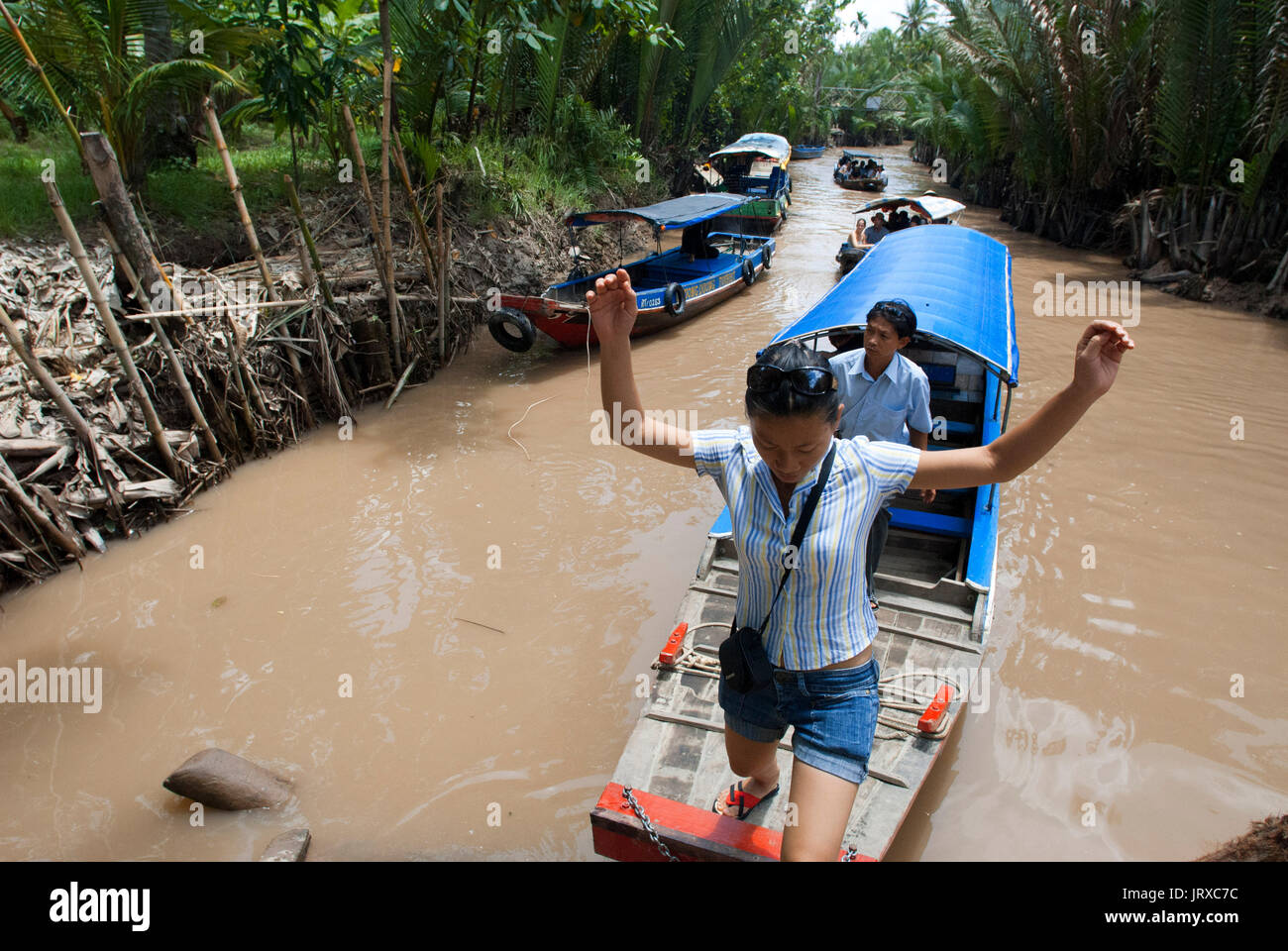 Boat on Mekong river, near My Tho village, Vietnam. Bao Dinh channel ...